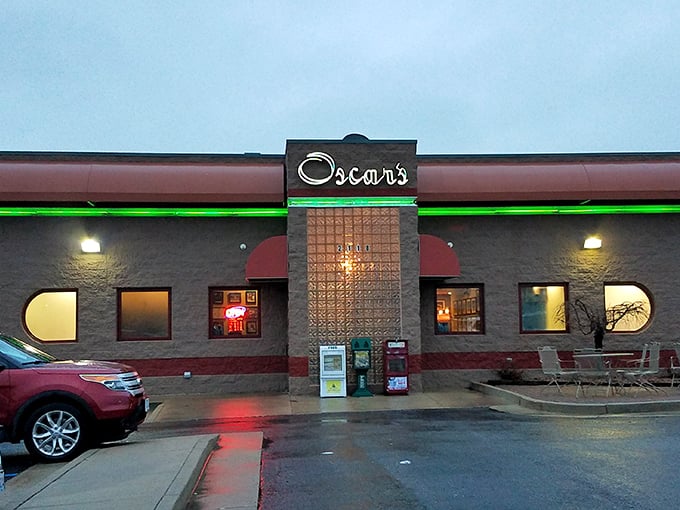 Oscar's welcoming exterior glows with promise as dusk settles, the neon sign beckoning hungry travelers like a lighthouse for breakfast enthusiasts.
