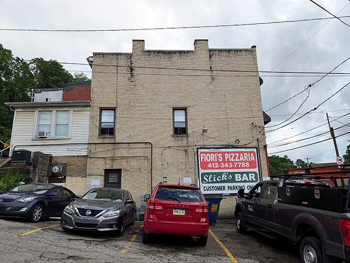 The plain brick walls of Fiori’s Pizzaria may not dazzle the eye, but behind them waits a Pittsburgh legend that’s been winning hearts one slice at a time.