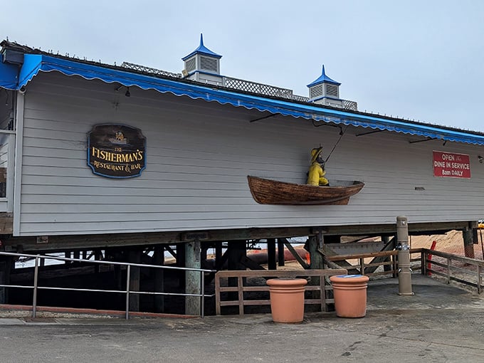 The iconic white exterior with blue trim says "California coast" before you even taste a bite. That little yellow fisherman has witnessed countless sunset proposals.