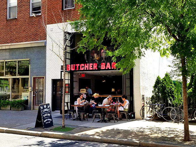 That iconic red neon sign isn't just announcing a restaurant—it's signaling a sanctuary for carnivores nestled in Philadelphia's charming Rittenhouse neighborhood.