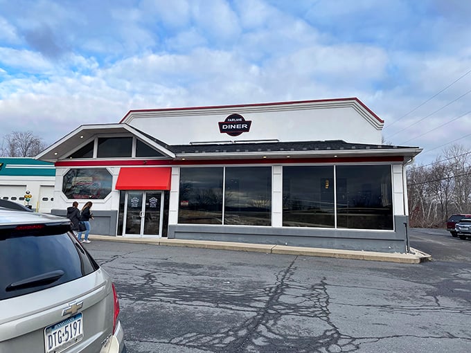 The classic red and white exterior of Fairlane Village Diner stands as a beacon of comfort food in Pottsville's landscape.