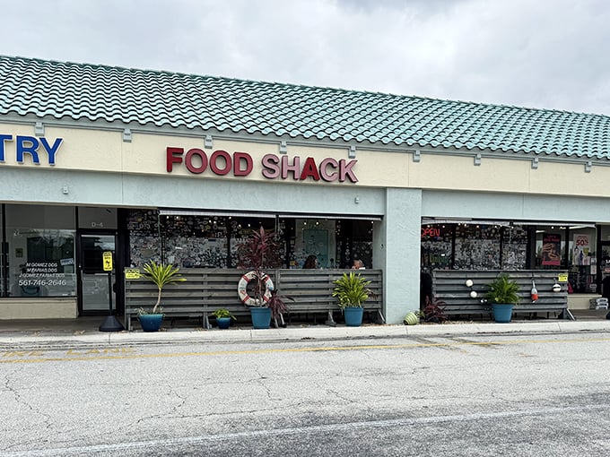 The unassuming exterior of Food Shack belies the culinary treasures within. Like finding Shakespeare writing in a mall food court.