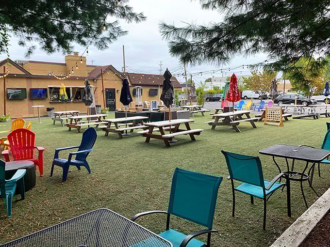 The outdoor beer garden at The Fainting Goat is Pennsylvania's answer to European leisure—picnic tables, colorful chairs, and not a single rush to be found.