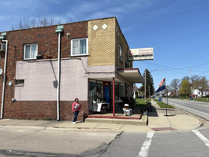 The unassuming storefront of Be Back Antiques beckons with treasures spilling onto the sidewalk—a preview of the organized chaos waiting inside.