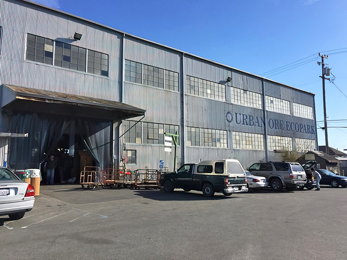 The unassuming exterior of Urban Ore belies the wonderland within—like finding a portal to the past disguised as an industrial warehouse.