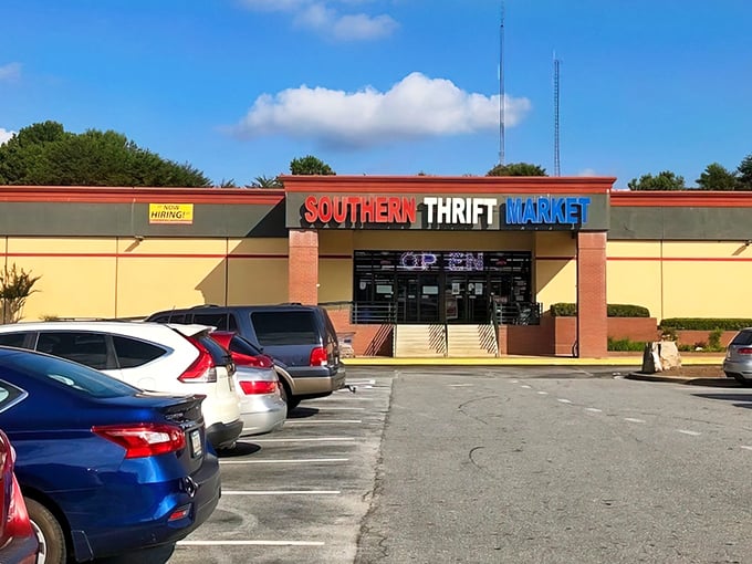 The red, white, and blue sign beckons like a patriotic promise of bargains within. This unassuming storefront holds treasures waiting to be discovered.