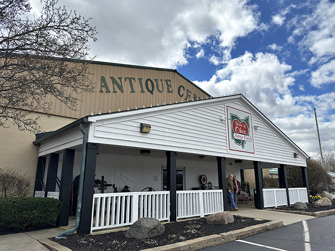 The welcoming facade of Heart of Ohio Antique Center stands proudly against blue Ohio skies, promising treasures within its unassuming exterior.