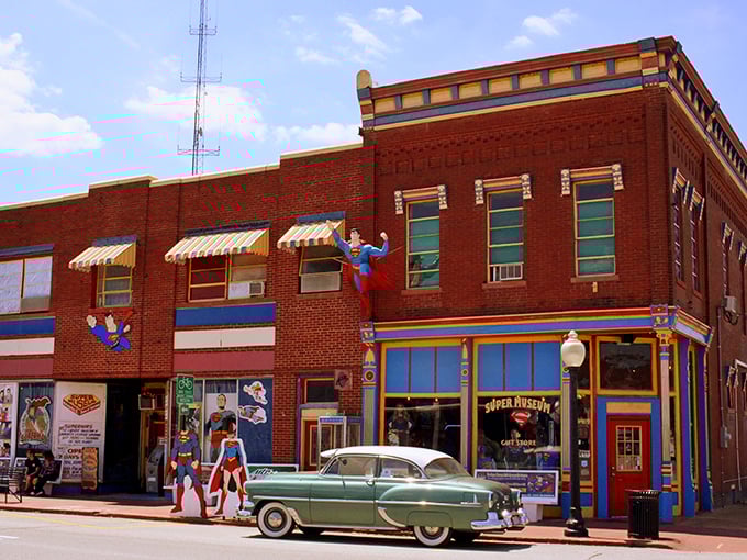 The iconic red brick exterior of the Super Museum stands proudly on Market Street, complete with Superman figures ready to take flight from the façade.