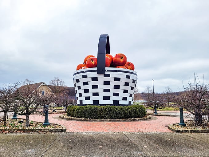 The ultimate picnic accessory for giants! Ohio's World's Largest Apple Basket stands proudly against the cloudy sky, a monument to whimsical thinking.
