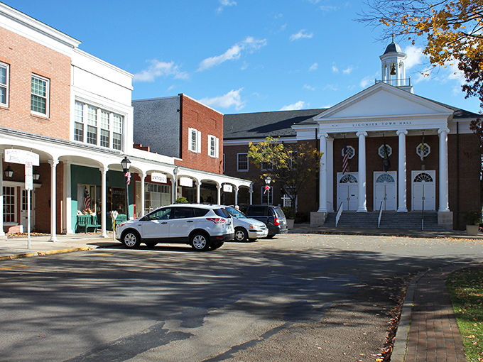 Main Street magic unfolds where colonial charm meets modern convenience in perfect small-town harmony.