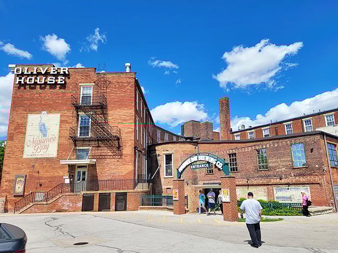 The iconic archway welcomes you like an old friend, promising cold brews and warm memories beneath that Toledo sky.