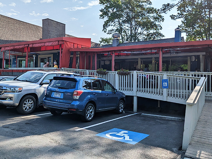 Southern comfort waits inside—just look for the little blue house with a cars out front.