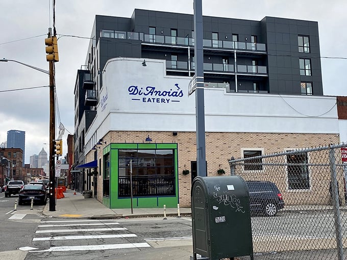 The corner spot with the bright green window frames isn't trying to hide – DiAnoia's announces itself to Pittsburgh's Strip District with confident charm.