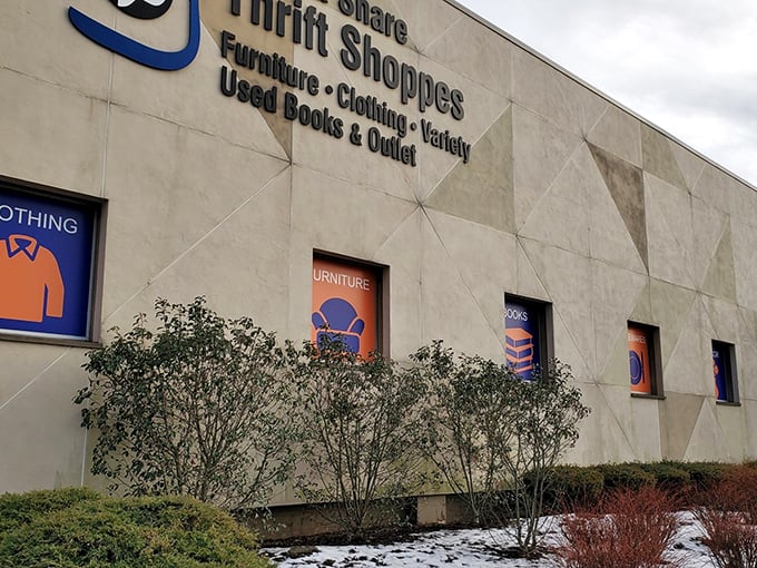 The exterior facade of Care & Share Thrift Shoppes stands like a department store of possibilities, with clear signage guiding treasure hunters to their quarry.