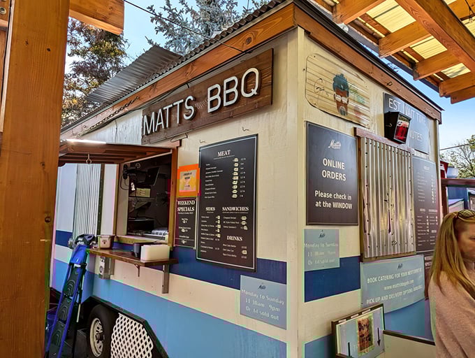 The humble blue and white cart that's sparked barbecue pilgrimages across Portland. Texas-style smoke meets Pacific Northwest passion.
