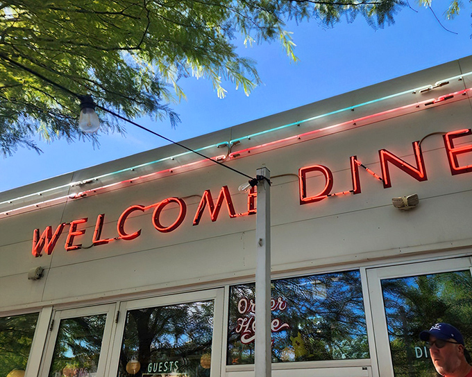 That iconic red neon sign isn't just illuminating the Phoenix night—it's beckoning you toward biscuit nirvana like a carb-loving lighthouse.
