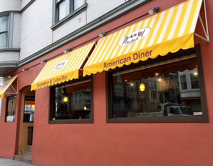 That cheerful yellow awning isn't just decoration – it's a breakfast beacon calling hungry souls home.