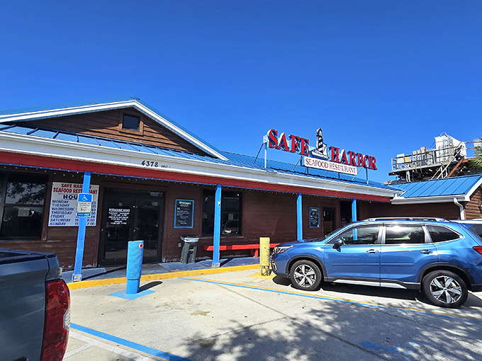 The bright blue roof of Safe Harbor stands out against Florida's sky like a beacon calling seafood lovers home.
