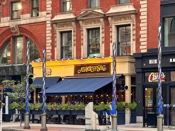 The golden facade of Atlantic Fish Company stands out on Boylston Street like a beacon for seafood lovers—nautical elegance in Boston's Back Bay.