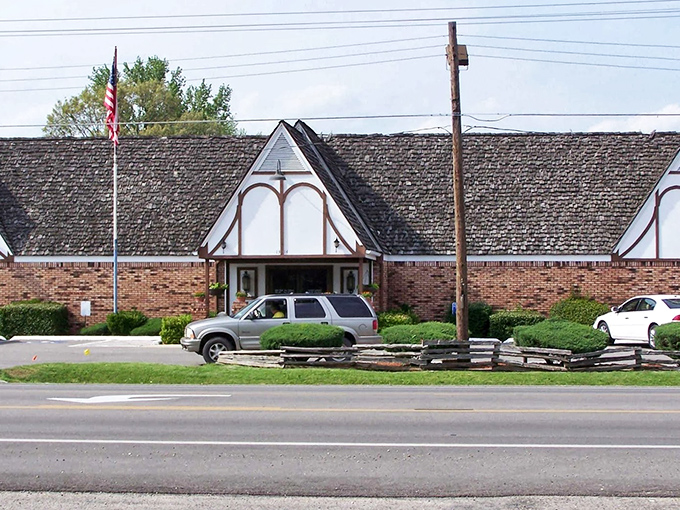 The distinctive peaked roofline and brick facade whisper "serious barbecue lives here" to every passing car on the highway.
