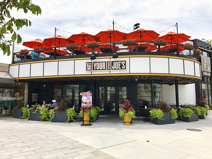 Those signature red umbrellas aren't just for show—they're like a culinary lighthouse guiding you to flavor town on the restaurant's stylish rooftop patio.