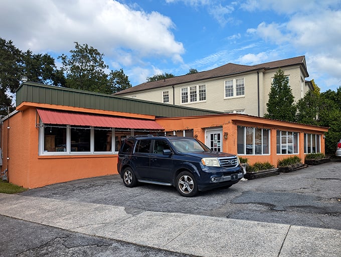 The unassuming orange exterior of Mediterranean Tea Room stands like a culinary lighthouse in Columbia, promising authentic flavors behind its modest façade.