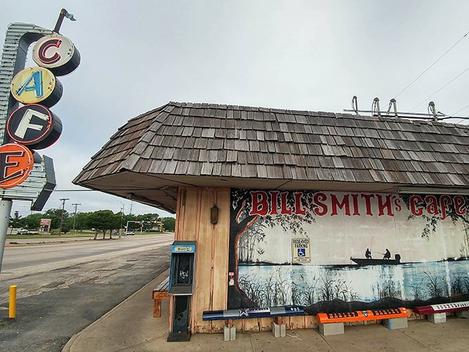 The iconic mural outside Bill Smith's Cafe tells you everything you need to know—this place values fishing, food, and small-town charm equally.