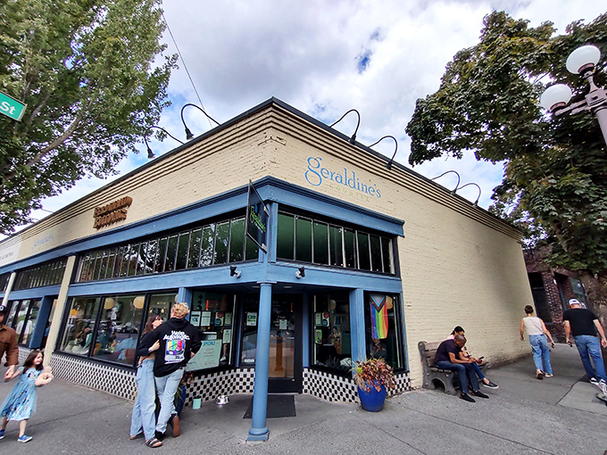 The cream-colored exterior with bright blue trim isn't just inviting—it's practically waving you in for breakfast bliss at Geraldine's Counter.