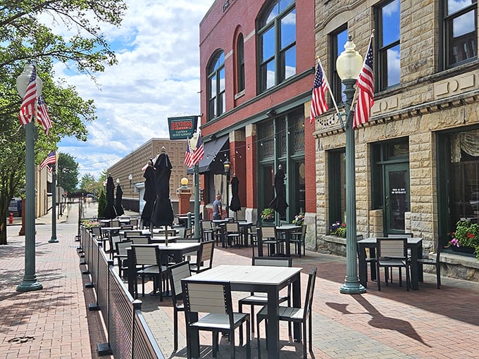 The historic brick facade of Bender's Tavern stands proudly on Canton's streets, its green trim and outdoor seating beckoning hungry travelers like a culinary lighthouse.