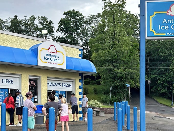 The blue-awninged beacon of frozen delight stands proudly in Pittsburgh, promising handmade happiness with its "MADE HERE, ALWAYS FRESH" guarantee.