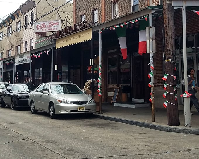 The iconic Villa di Roma sign glows like a beacon in Philadelphia's Italian Market, promising culinary traditions that have stood the test of time.