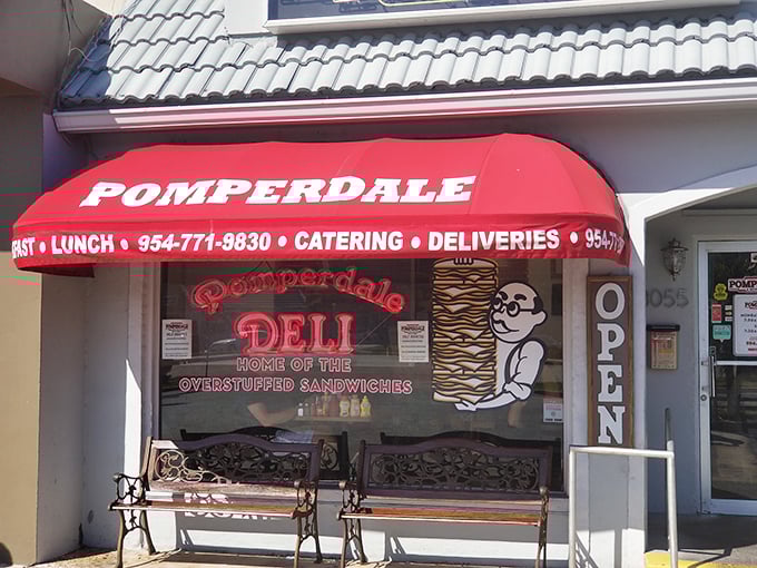 That cartoon character holding a towering sandwich isn't false advertising—it's a promise Pomperdale keeps with every order.