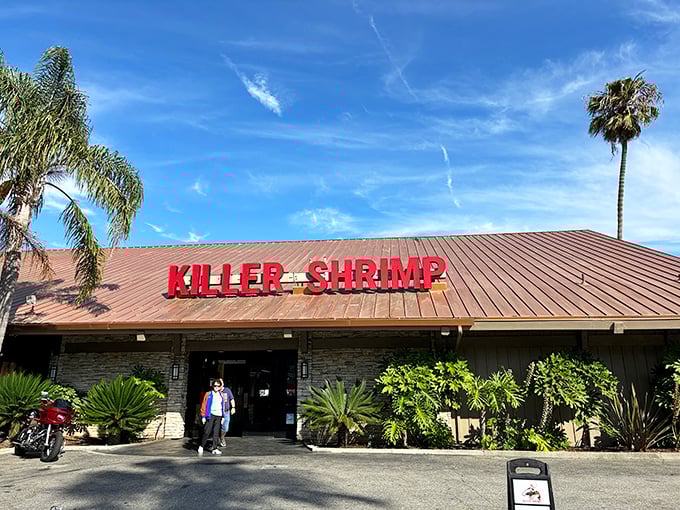 Palm trees stand guard outside Killer Shrimp's unassuming exterior, like bouncers protecting a secret culinary treasure in Marina Del Rey.