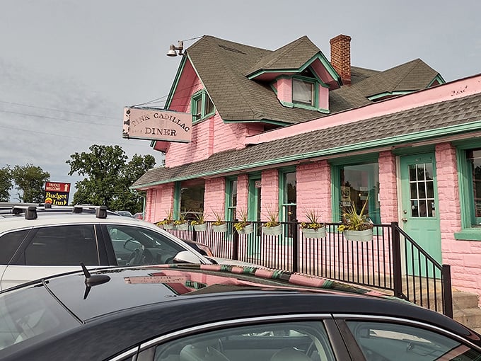 Step inside and time-travel to the 1950s with classic checkered floors and turquoise accents. The jukebox isn't just decoration—drop a quarter and suddenly your pancakes have a soundtrack.