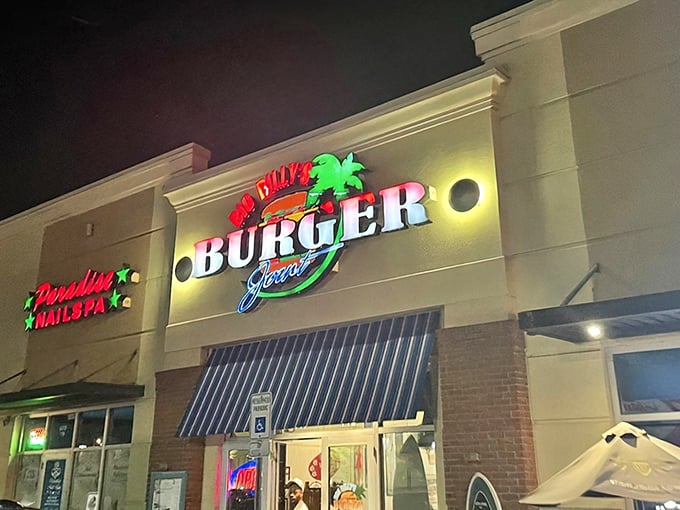 After dark, Big Billy's glows with promise—a beacon of burger brilliance nestled between everyday storefronts.