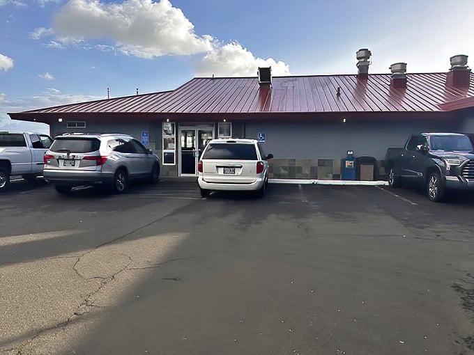 The unassuming exterior with its distinctive red roof might not scream "culinary destination," but locals know better. Hidden treasures await inside.