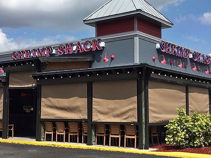 The lighthouse-inspired tower says "come on in" while the shrimp graphics practically wink at hungry passersby.