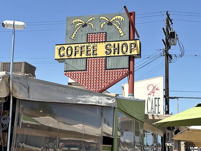 That vintage sign isn't just retro charm—it's a beacon of breakfast hope in Bakersfield, promising palm trees and properly cooked eggs in equal measure.