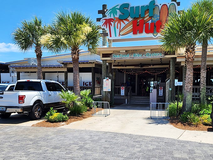 Palm trees stand guard at this beachside haven where the sign promises exactly what you'll find inside: seafood that tastes like vacation feels.