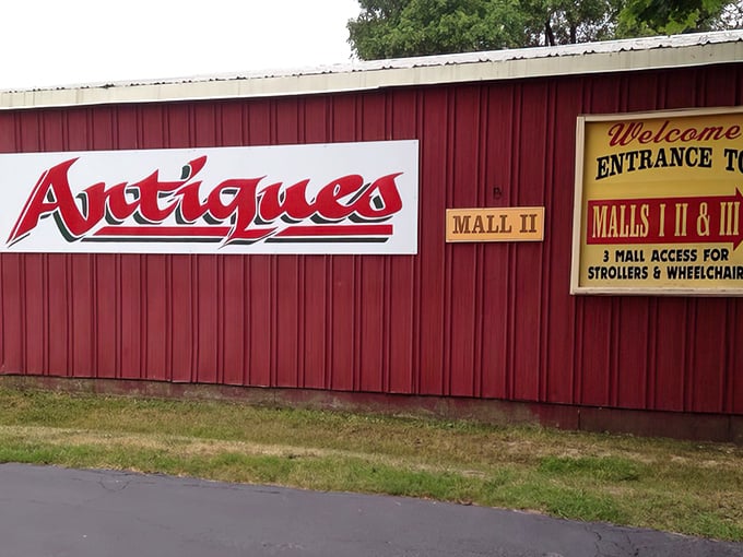 The iconic red barn exterior isn't hiding farm animals—it's sheltering treasures from yesteryear. American flag included, nostalgia guaranteed.