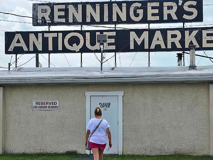 The iconic Renninger's sign glows against a Pennsylvania sunset, beckoning treasure hunters like a Vegas marquee for the vintage-obsessed.