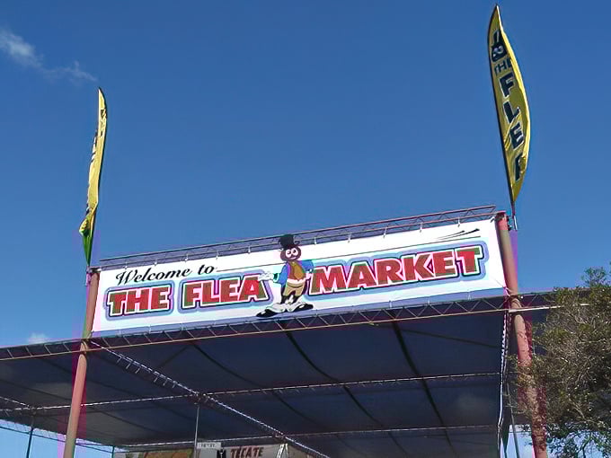 That cheerful flea mascot knows what's waiting inside - California's ultimate treasure hunting playground where memories are made.