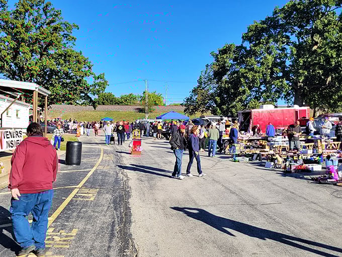 Weekend warriors on the hunt! The outdoor section buzzes with activity as shoppers scan tables for that perfect something they didn't know they needed.
