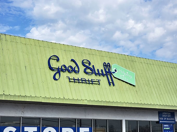 The lime green facade of Good Stuff Thrift stands out like a beacon for bargain hunters, promising treasures within those sliding glass doors.