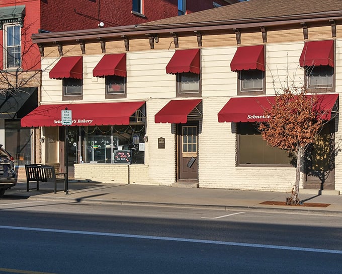 The cream-colored façade with those iconic red awnings isn't just a bakery—it's Westerville's morning headquarters for happiness.