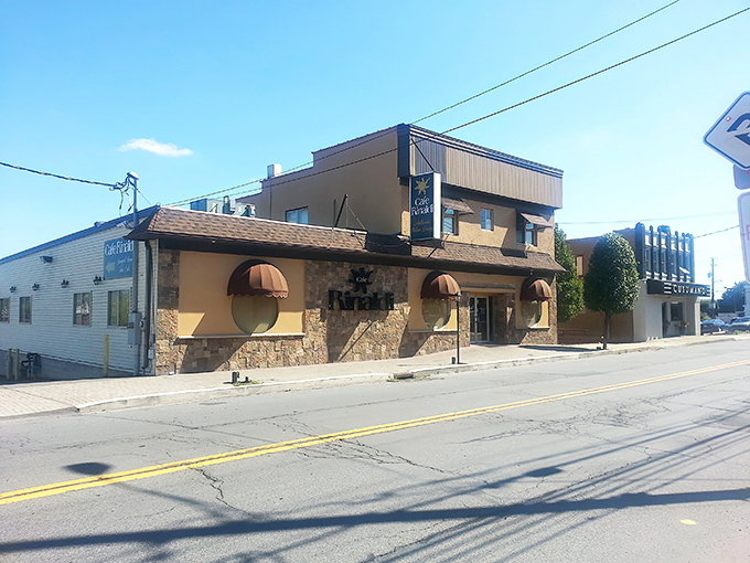 The unassuming exterior of Cafe Rinaldi hides Old Forge's greatest treasure – rectangular pizza trays worth crossing state lines for.