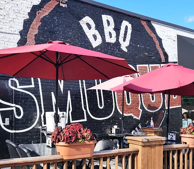 Smoque's iconic black and white exterior wall art isn't just signage—it's a beacon of hope for barbecue pilgrims seeking salvation through smoke.