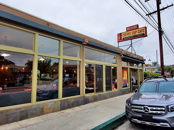 That classic diner sign isn't trying to impress anyone – it's too busy being perfect.