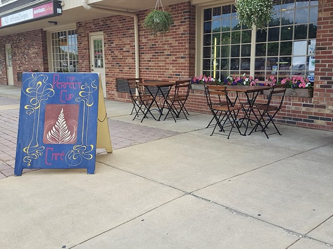 Outdoor seating with colorful flower boxes creates a European sidewalk cafe vibe—perfect for sipping lattes while watching Hockessin go by.