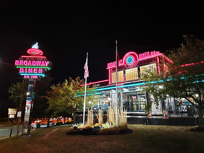 That neon glow promises serious comfort food magic – Broadway Diner's exterior welcomes you home before you even step inside.